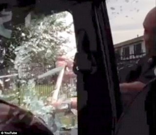 Police Breaking Car Window 2 | AFRO American Newspapers