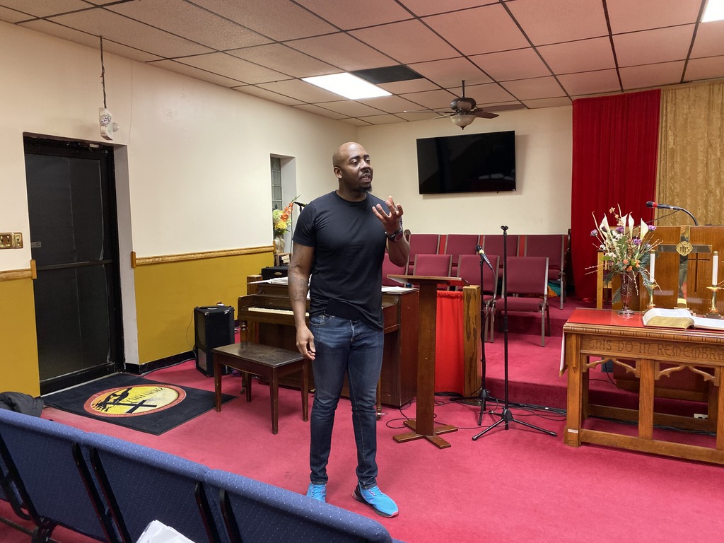 Angelo Johnson leading choir rehearsal. (Courtesy Photo) | AFRO ...