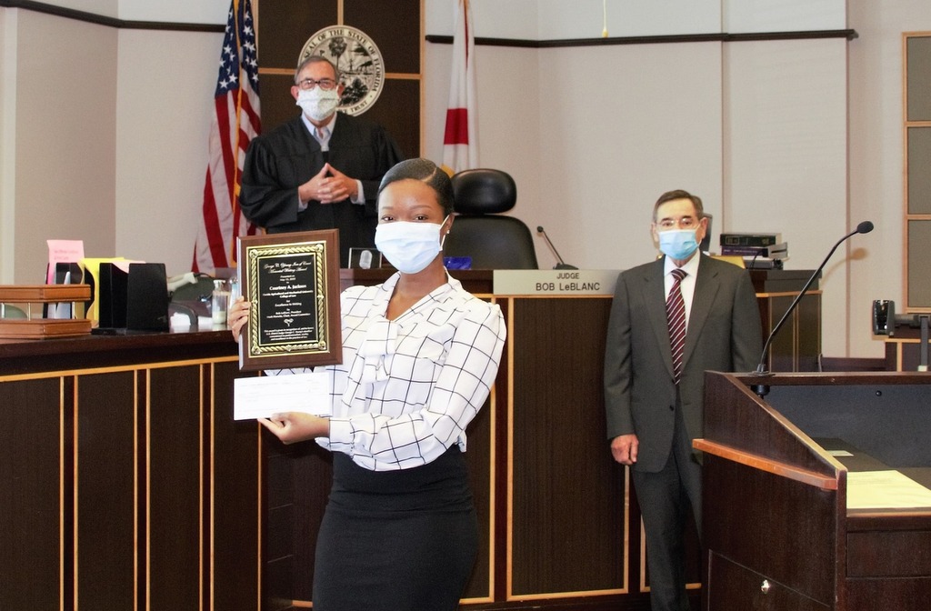 Courtney Jackson Accepts Award-001 | AFRO American Newspapers