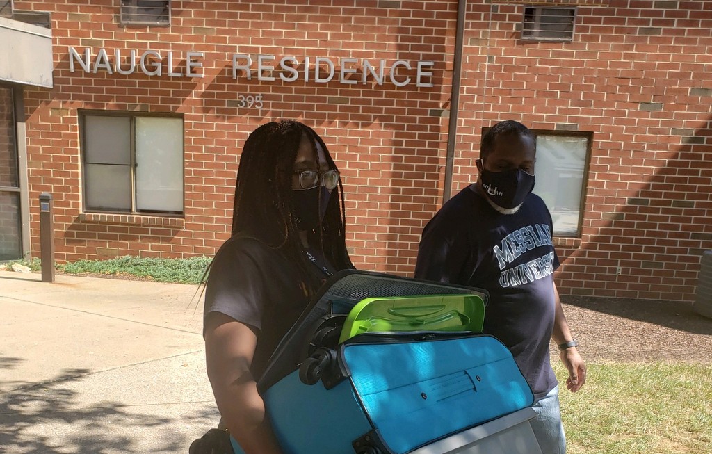 Pastor Jamal Brown and daughter-001 | AFRO American Newspapers