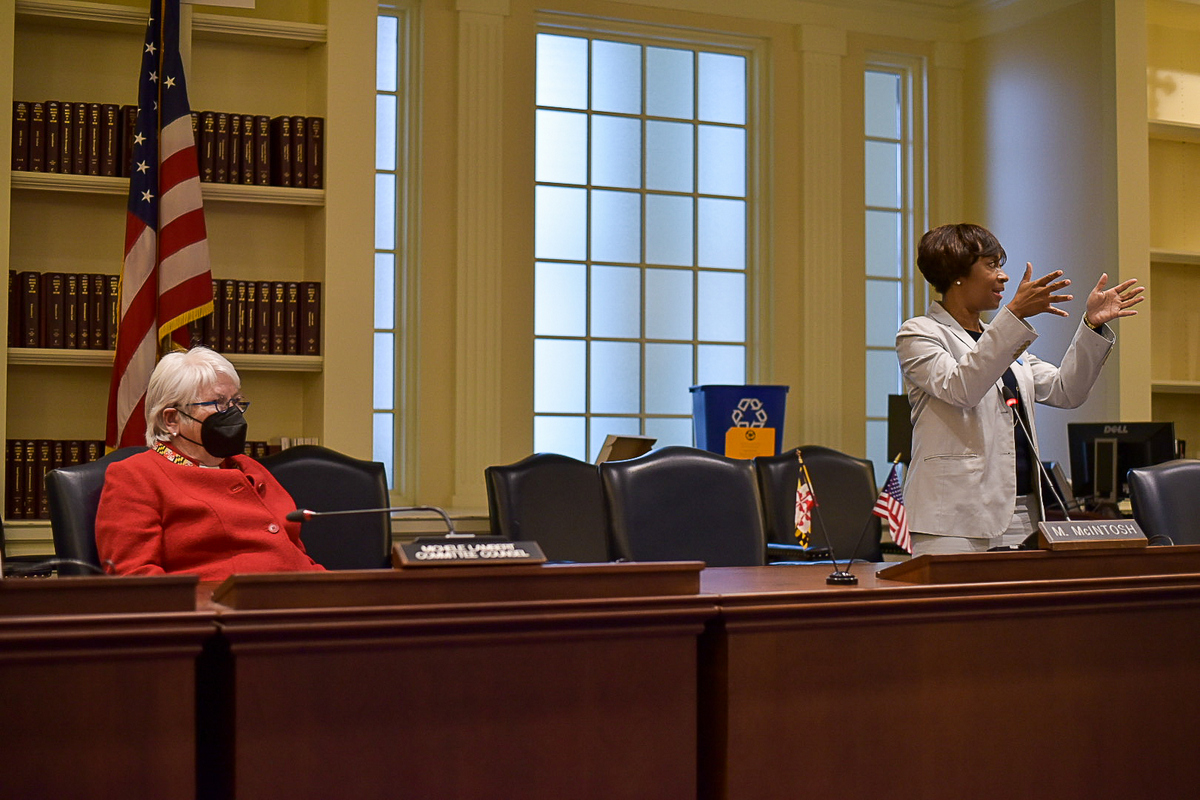 Left Delegate Maggie McIntosh Right One Love Executive Director Ojeda ...